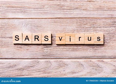 Sars Virus Word Written On Wood Block Sars Virus Text On Wooden Table For Your Desing