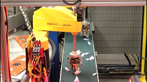 loading and unloading improved with scara robotics remtec robotics and automation