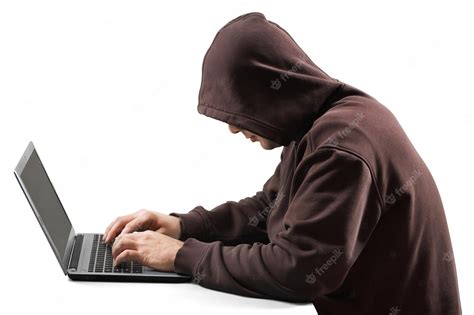 Premium Photo Hacker Using Laptop Hacking The Internet
