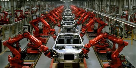 Automated Car Manufacturing Process With Robotic Arms Stock