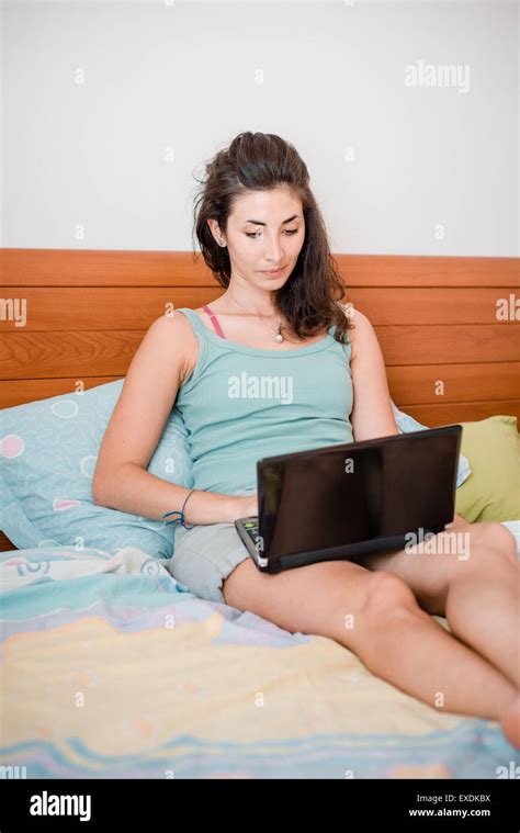 Beautiful Woman Using Notebook At Home Stock Photo Alamy