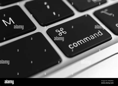 command key and button on keyboard command sign close up modern