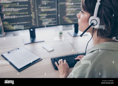 profile side view portrait of attractive confident girl coding writing