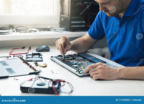 Computer Repair Service Technician Repairing Broken Laptop Stock Image Image Of Repairing