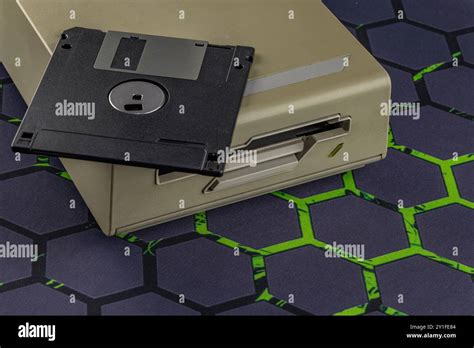 Old Damaged Inch Floppy Disk Drive Colorful Floppy Disks Arranged On A Mouse And Keyboard