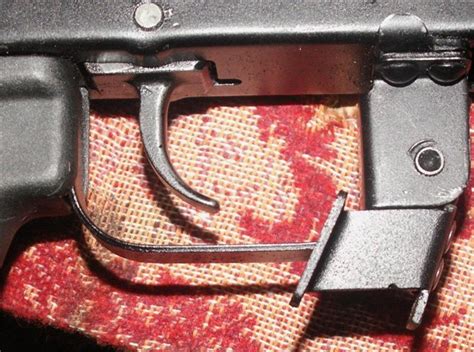 Двухсторонние кнопки сброса и флажки на предохранитель(У меня дешевле)