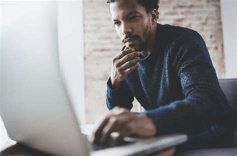 Man Using Form Io On A Laptop