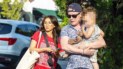 Macaulay Culkin And Brenda Song Bring Son Dakota To Farmers Market