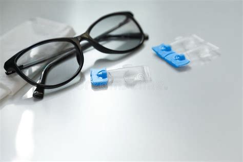 Single Dose Eye Drops Glasses And Fabric On Table Space For Text