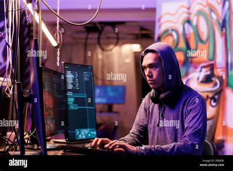 Asian Hacker Cracking Password To Get Illegal Access To Database