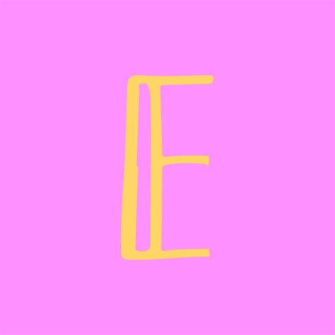 The Letter E Is Made Out Of Wood And Has An Orange Color On It S Surface