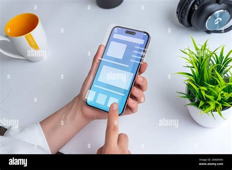 Woman Holding A Smartphone With A Conceptual User Interface The Interface Showcases A Clean