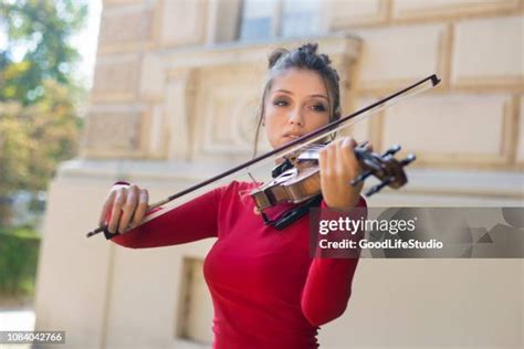 Violinist Street Photos And Premium High Res Pictures Getty Images