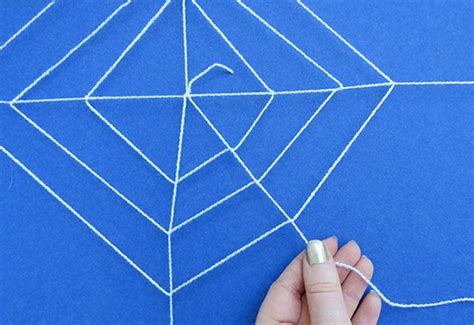 How To Make A Spider Web Out Of Rope Knots EHow Spider Web Halloween Decorations Spider