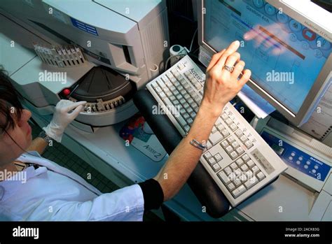 Immunology Lab Technician Working In An Immunology Laboratory Photographed In Antibes France