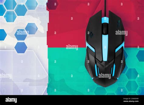 Madagascar Flag And Modern Backlit Computer Mouse Concept Of Country Representing E Sports Team