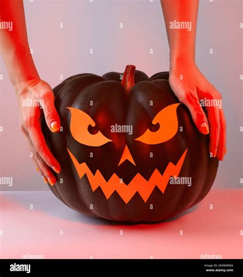 Halloween Pumpkin With Paper Cut Scary Face In Trend Red Color Jack