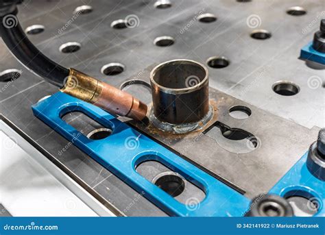 Robot Welding Steel Industrial Welding Robot And Working With Metal Parts Robot Welds Steel