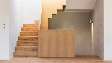 Stone Apartment Building In Bucharest Features Recessed Terraces