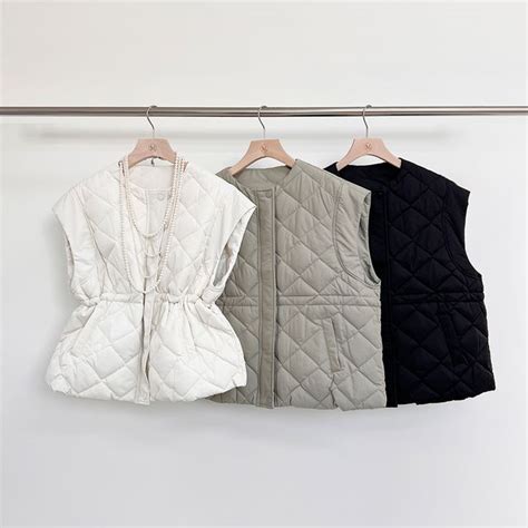 미즈큐즈 허리 스트링 퀼팅 다이아 루즈핏 경량 패딩 조끼 베스트 위시버킷