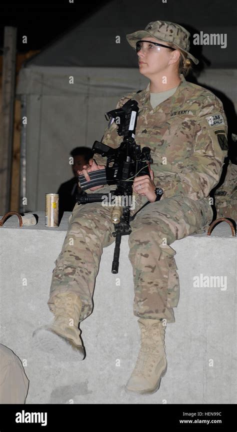 U S Army Sgt Anna Simms Sits On Top Of A Bunker At Forward Operating Base Gamberi To Get A