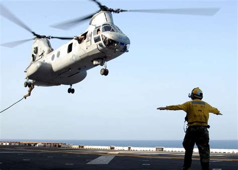 Us Navy 080925 N 2074h 019 An Aviation Boatswains Mate Handling