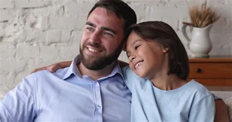 Happy Dad And Preteen Son Sitting Close Stock Video Pond