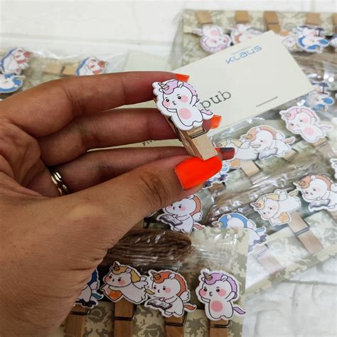 قیمت و خرید گیره عکس کلاوس طرح اسب تک شاخ پرنده کد 38 مجموعه 10 عددی