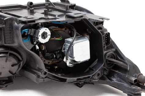 Premium Photo Plastic Spare Part Of A Black Car On A White Background Rear View Xenon