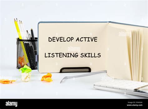 Business And Develop Active Listening Skills Concept Develop Active Listening Skills On A Blank