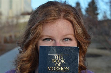 Sister Missionary Pose With The Book Of Mormon The Book Of Mormon