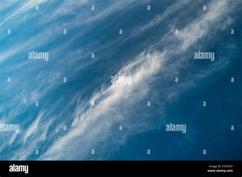 Photograph Of Prominent Clouds In A Blue Sky In Sunlight Taken With A Polarizing Filter Stock