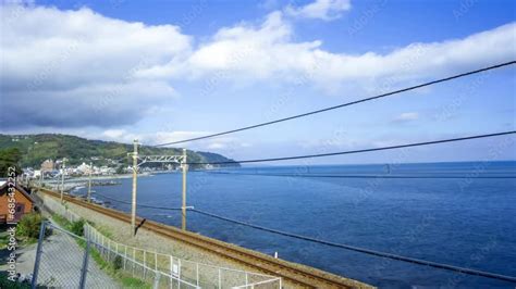 伊豆タイムラプス 青い海と伊豆急行線 Stock Video Adobe Stock