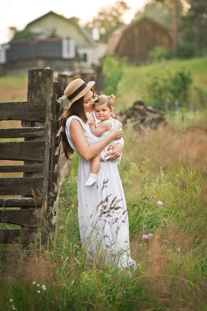 Premium Photo A Gentle Portrait Of A Mother And Daughter In Nature 3000