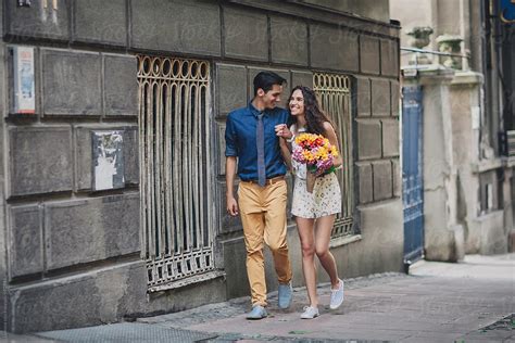 Happy Couple Having A Walk By Stocksy Contributor Lumina Stocksy