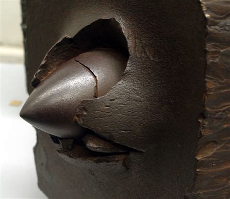 Armor Piercing Shell From A 17 Pdr Gun Embedded In A Section Of Armor From A Tiger I Tank