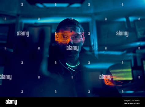 Portrait Of A Cyber Hacker Stealing Information Using A Computer Cybercrime And Data Security
