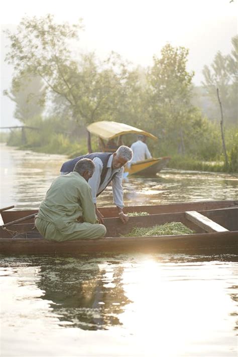 Foto De Stock Gratuita Sobre Canoas Dal Lake Embarcación Góndolas India Luz Del Sol