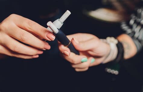 Premium Photo Smoking Modern Hybrid Cigarette Device Heatnotburn