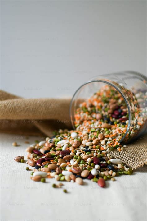 다양한 종류의 음식으로 가득 찬 항아리 사진 Unsplash의 유리 항아리 이미지