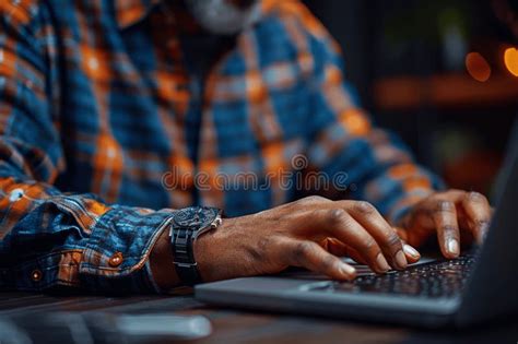 close up of male hands typing on laptop with coding screen for software development stock