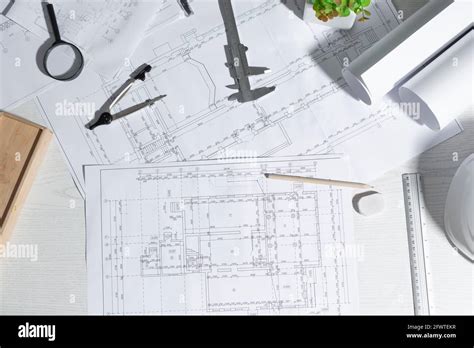 Work Desk Of The Architect Of The Design Project Sketches Workplace Of A Civil Engineer