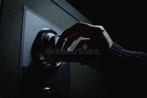 Turning A Password On Dial For Open The Safe Box Keep Money And Valuables In The Vintage Safe