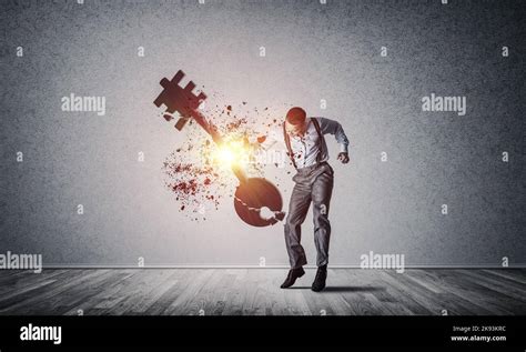 breaking through access concept with man in room crashing concrete key