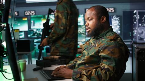 Military Agent Working Overtime In Control Room To Analyze Aerial Reconnaissance Data Feeling