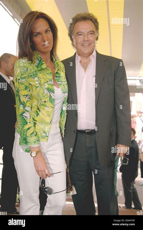 French Businessman Alain Afflelou And His Wife Rosalie Pictured At The