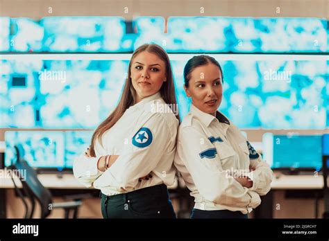 Group Portrait Of Female Security Operator While Working In A Data