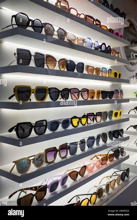 Storefront Shelves Of Various Modern Sunglasses In Retail Store