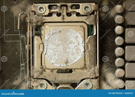 Very Dirty Computer Processor Dusty CPU Microchip On A Computer Motherboard With Traces Of