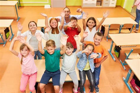 Happy School Students Waving In Classroom Stock Image Image Of Diversity Preteen 302990991 Happy School Students Waving In Classroom Stock Image Image Of Diversity Preteen 302990991